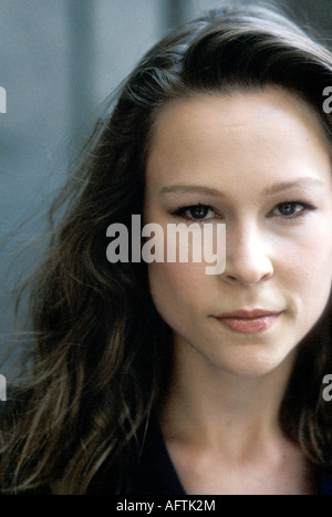 Young Asian businesswoman thinking and Staring at Computer Screen in ...