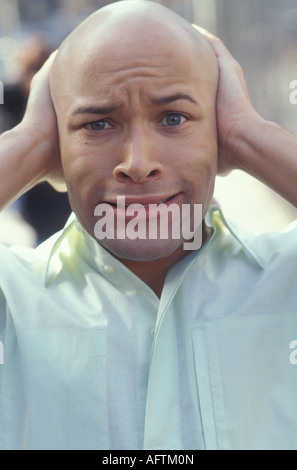 Image of screaming confused young man posing isolated over white wall ...