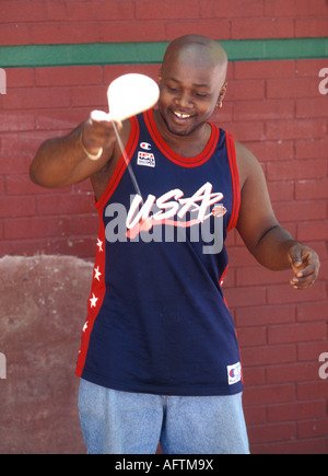 African american man playing paddle tennis indoors Stock Photo - Alamy