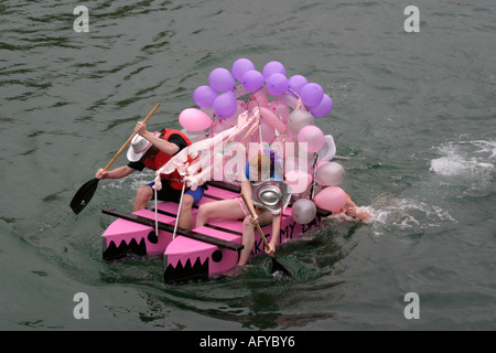 Charlestown regatta Cornwall raft race baywatch babes in drag Stock ...
