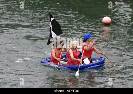 Charlestown regatta Cornwall raft race baywatch babes in drag Stock ...
