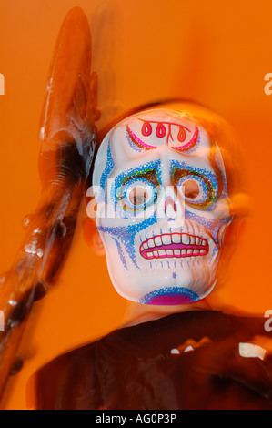 Trick or Treat. child wearing skeleton costume sitting at Halloween ...