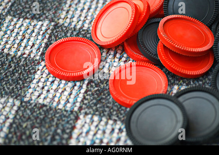 Red and Black Checkers Game Pieces Isolated on White Background Stock ...