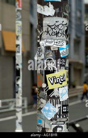 Street lantern marked with graffiti and stickers Stock Photo - Alamy