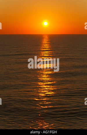 Summer sun rise over the sea Stock Photo - Alamy