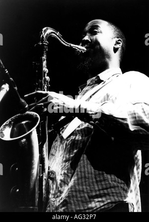 Jazz musician playing saxophone Stock Photo - Alamy