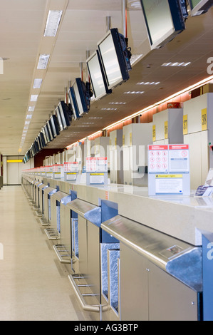 Empty check-in desks at Edinburgh Airport, where flights have been ...