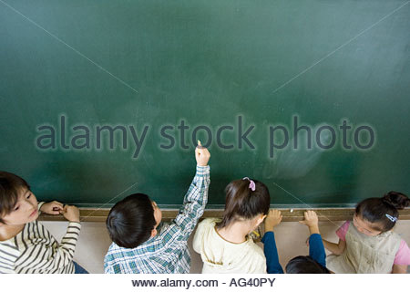 primary school child writing on white board with marker pen Stock Photo ...
