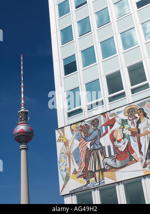 East German office "Haus des Lehrers" building with communist murals on facade Alexanderplatz ...