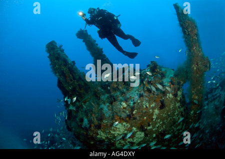 Diver on the wreck the US Submarine tender USS Macaw sunk in the World ...