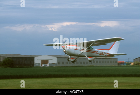 Cessna 172 light aircraft with propeller turning adjacent to a Active ...