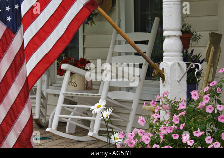 Victorian Porch, American Flag & Rocking Chair on Main Street USA Stock ...