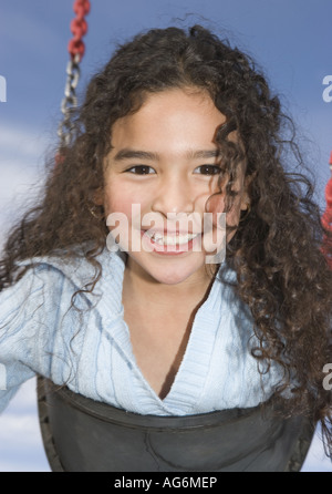 Adorable hispanic girl smiling confident playing video game at street ...