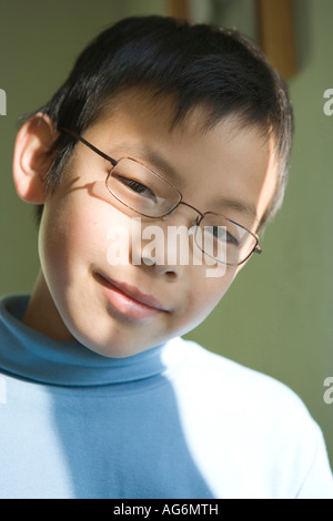 Portrait boy male age ten smile pleasant happy long blond haircut ...
