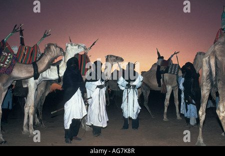 Niger, Timia. A tribal Tuareg and his Camels at the Oasis of Timia ...