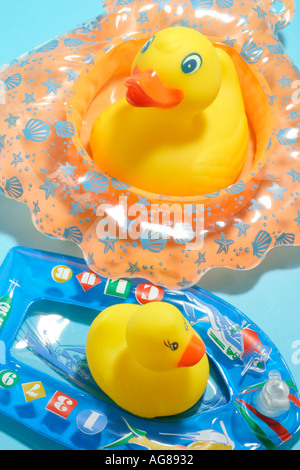 Yellow floater on a swimming pool water surface Stock Photo - Alamy