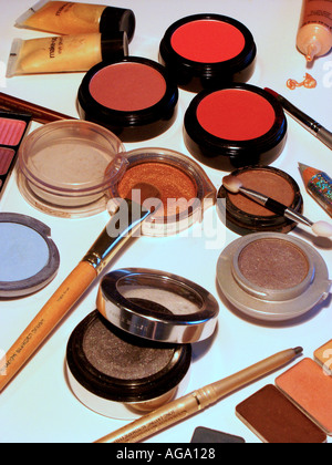 brown shimmer cream eyeshadow pots cut out onto a white background ...