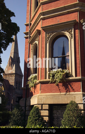 Church of the Covenant reflection in window on Commonwealth Avenue with ...