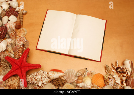 Blank notebook with shell decoration Stock Photo - Alamy