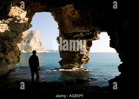 Sea caves at Platja de Moraira Costa Blanca Spain Stock Photo - Alamy