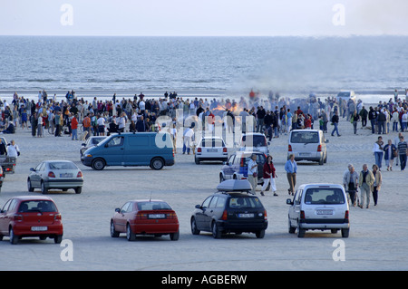 Denmark Fano cars parked on the beach during the traditional midsummer ...