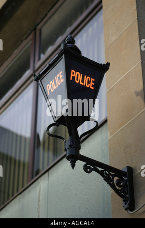 Old fashioned police lamp on the exterior of a police station in ...