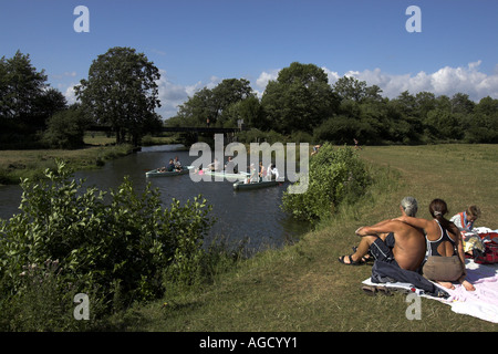 People enjoying a Sunday afternooons boating at Barcombe Mills, Sussex ...