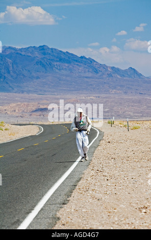 Lone runner in Death Valley, during Badwater, 135 miles ultramarathon ...