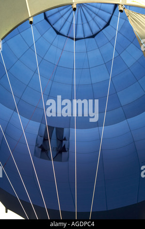 Hot air ballooning pilot of a single one man balloon with no basket ...