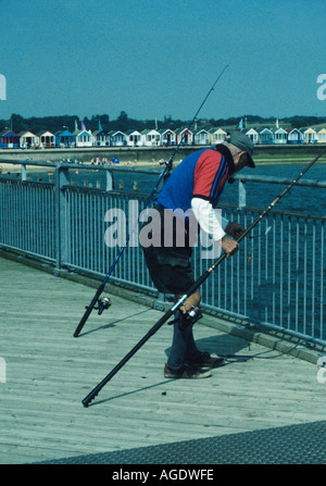 Fishing on the pier at Southwold, Suffolk, England, UK Stock Photo - Alamy