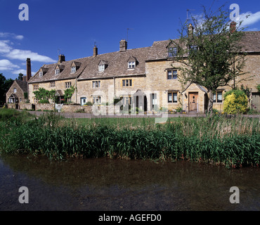 The River Windrush at Windrush Mill in the Cotswold village of Windrush ...