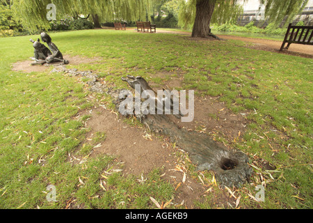 Guildford UK - Alice and The White Rabbit sculpture statue by River Wey ...
