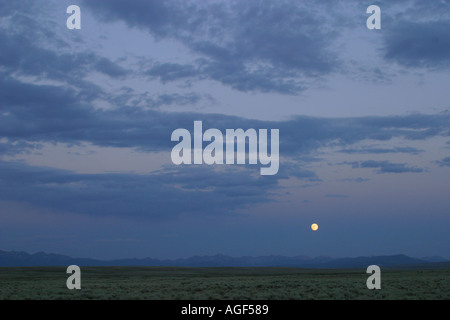 Moonrise over Colorado Front Range Stock Photo - Alamy