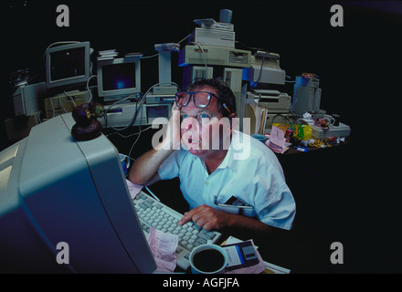 Two stressed and worried businessmen working with laptop computer Stock ...
