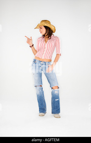 Portrait of cowboy pointing gun on wild west film set, Fort Bravo ...