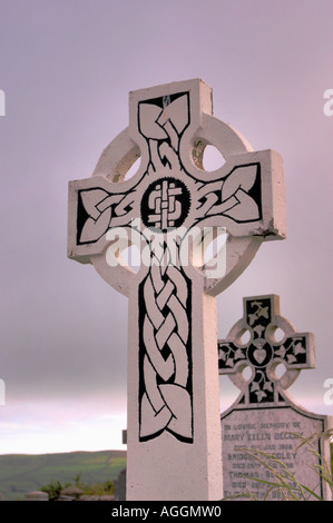 celtic cross gravestone in the graveyard at St John the Apostle ...