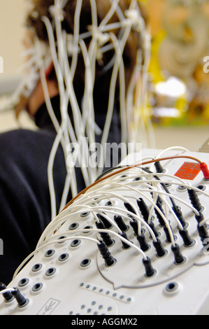 Measuring brain waves with EEG machine Stock Photo - Alamy