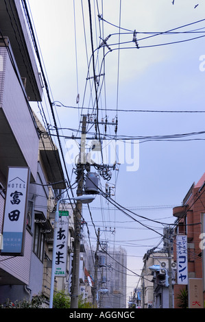 electrical wires hanging over backstreet, Tokyo, Japan Stock Photo - Alamy