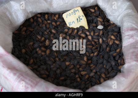 black kuaci pumpkin seed Asian snack Stock Photo - Alamy
