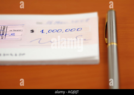 One Million Dollar Cheque Stock Photo - Alamy