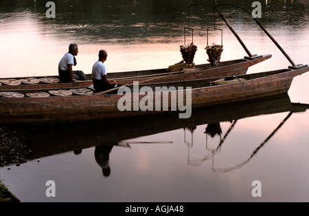 Ukai fishing professionals wait on traditional boats Ubune for dark to ...