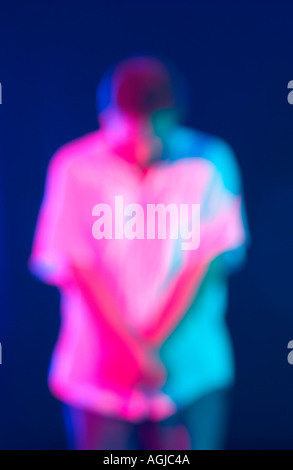 Blurred figure acting frustrated Stock Photo - Alamy