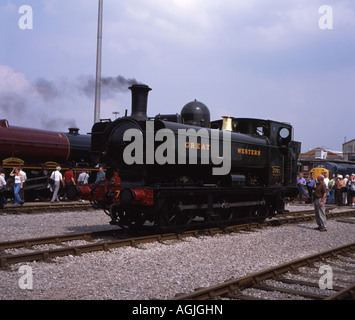 GWR 0-6-0 pannier tank steam locomotive No. 7752 on low loader lorry at ...