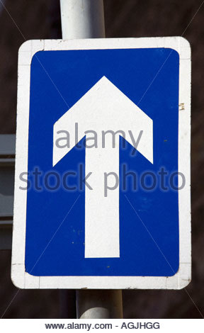 One Way traffic flow arrow, the only way sign on road with arrow ...