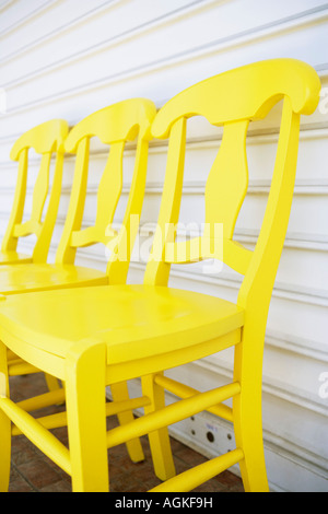 Three chairs in a row Stock Photo - Alamy