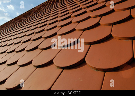 red roof tiles, newly tiled roof Stock Photo - Alamy