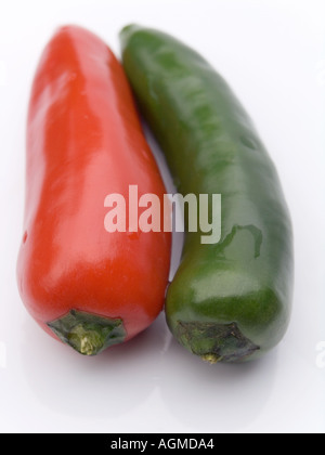 Two washed red peppers Stock Photo - Alamy