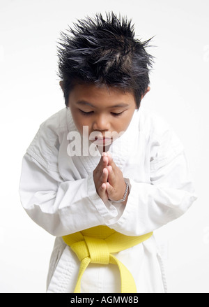 Young Karate kid, bowing Stock Photo - Alamy