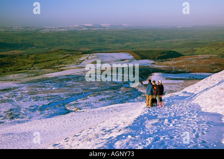 People walking up Hay Bluff stop to admire the view, Powys, Wales, UK ...