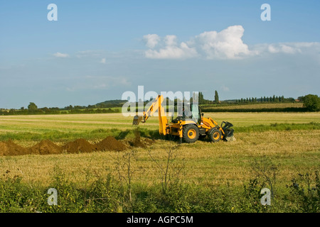 JCB digging drainage in the Rural area close to Ennerdale Water ...